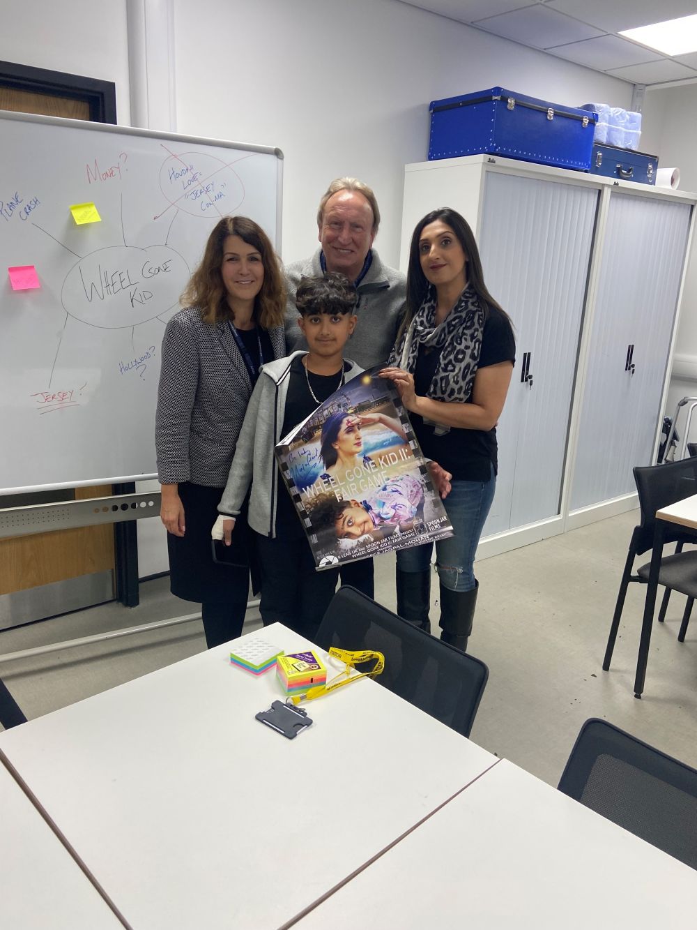 Footballing Legend Shares the Silver Screen with College Staff Members ...